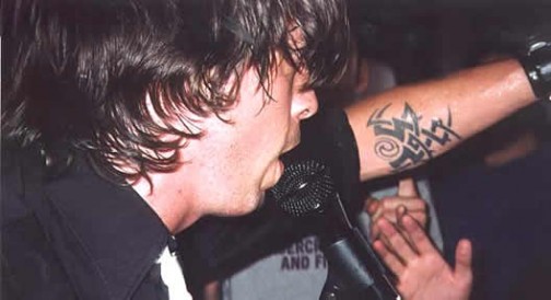 Dave Grohl Tattoos on His Left Forearm Seen On His Perform ...